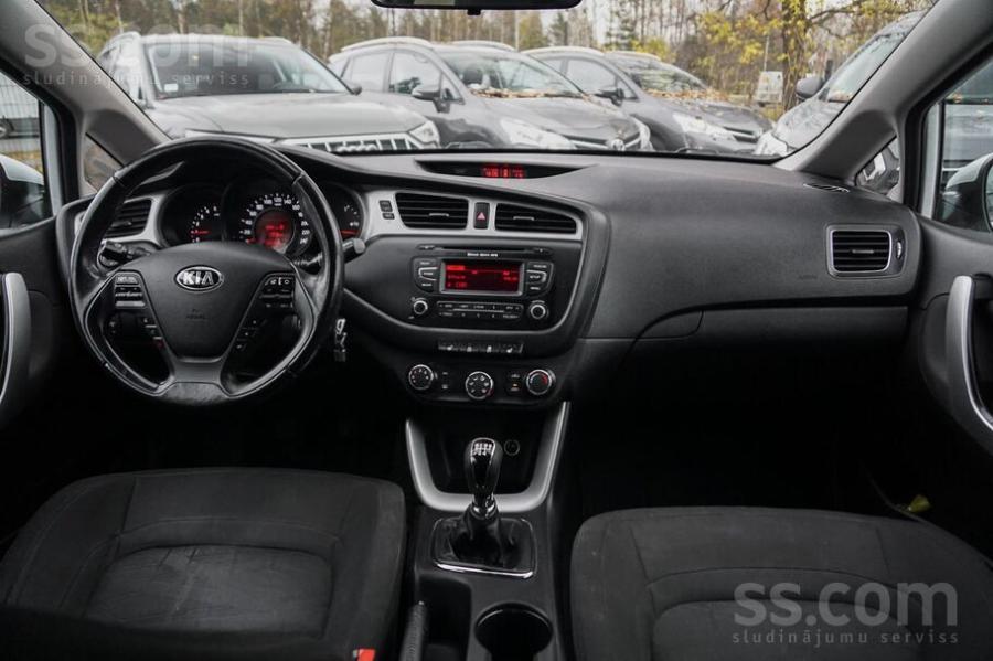White Kia Ceed 2013 in Riga, with an engine capacity of 1.40 L and mileage of 252 thousand km for 2990 €, photo 9 on AUTOMOTO.COM.LV