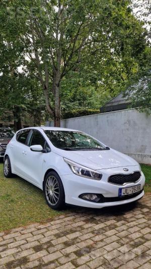 White Kia Ceed 2013 in Riga, with an engine capacity of 1.40 L and mileage of 186 thousand km for 3400 €, photo 4 on AUTOMOTO.COM.LV