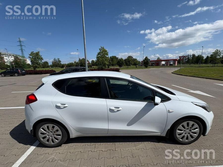 White Kia Ceed 2014 in Riga, with an engine capacity of 1.40 L and mileage of 156 thousand km for 3700 €, photo 3 on AUTOMOTO.COM.LV