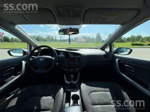 White Kia Ceed 2014 in Riga, with an engine capacity of 1.40 L and mileage of 156 thousand km for 3700 €, photo 4 on AUTOMOTO.COM.LV