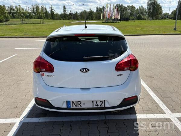 White Kia Ceed 2014 in Riga, with an engine capacity of 1.40 L and mileage of 156 thousand km for 3700 €, photo 4 on AUTOMOTO.COM.LV