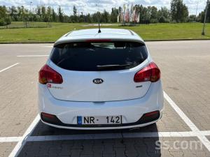 White Kia Ceed 2014 in Riga, with an engine capacity of 1.40 L and mileage of 156 thousand km for 3700 €, photo 5 on AUTOMOTO.COM.LV