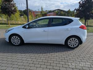 White Kia Ceed 2014 in Riga, with an engine capacity of 1.40 L and mileage of 223 thousand km for 3250 €, photo 5 on AUTOMOTO.COM.LV