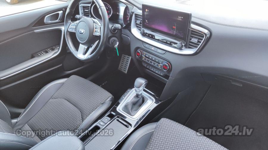 White Kia Ceed 2020 in Tartu, with an engine capacity of 1.40 L and mileage of 78 thousand km for 15990 €, photo 9 on AUTOMOTO.COM.LV