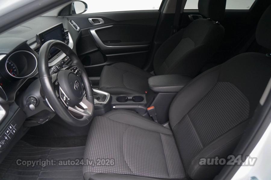 White Kia Ceed 2021 in Tallinn, with an engine capacity of 1.50 L and mileage of 98 thousand km for 14990 €, photo 7 on AUTOMOTO.COM.LV