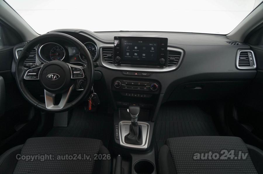 White Kia Ceed 2021 in Tallinn, with an engine capacity of 1.50 L and mileage of 98 thousand km for 14990 €, photo 8 on AUTOMOTO.COM.LV