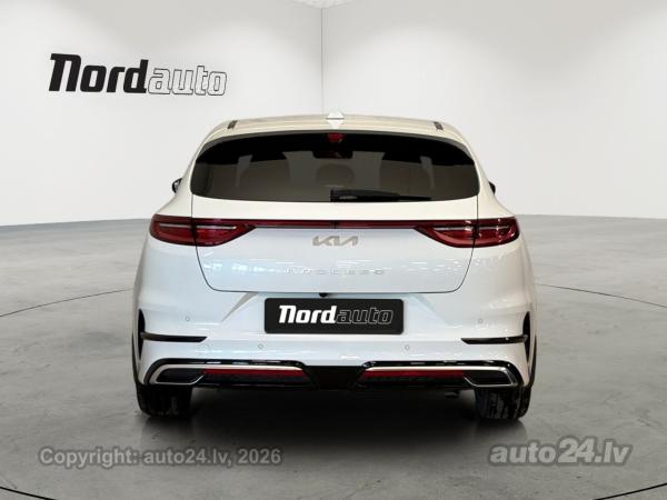 White Kia Ceed 2023 in Tallinn, with an engine capacity of 1.50 L and mileage of 58 thousand km for 22900 €, photo 4 on AUTOMOTO.COM.LV