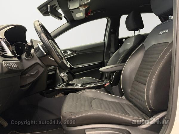 White Kia Ceed 2023 in Tallinn, with an engine capacity of 1.50 L and mileage of 58 thousand km for 22900 €, photo 5 on AUTOMOTO.COM.LV