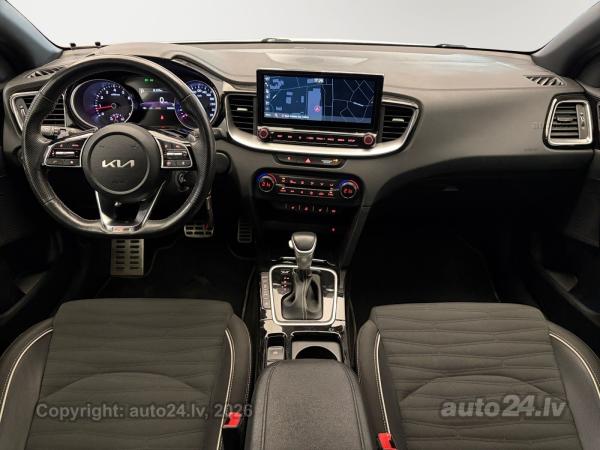 White Kia Ceed 2023 in Tallinn, with an engine capacity of 1.50 L and mileage of 58 thousand km for 22900 €, photo 7 on AUTOMOTO.COM.LV