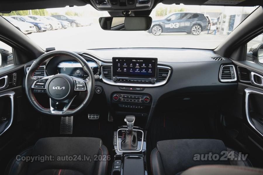 White Kia Ceed 2023 in Tartu, with an engine capacity of 1.60 L and mileage of 14 thousand km for 27900 €, photo 10 on AUTOMOTO.COM.LV