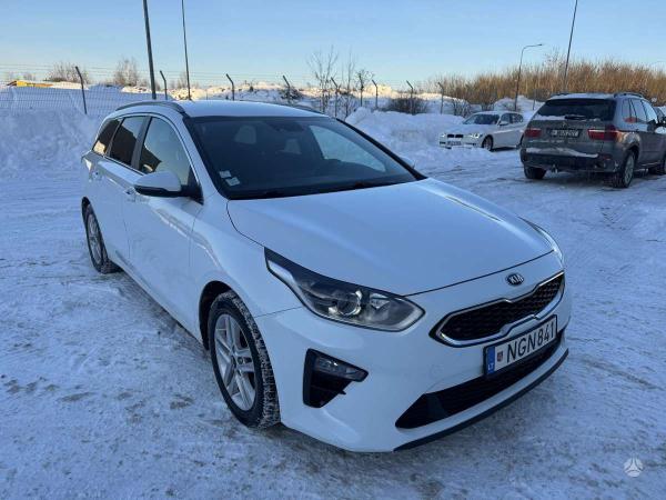 White Kia Ceed 2020 in Vilnius, with an engine capacity of 1.60 L and mileage of 217 thousand km for 9800 €, photo 10 on AUTOMOTO.COM.LV
