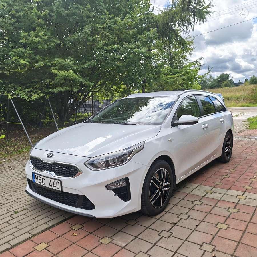 White Kia Ceed 2021 in Vilnius, with an engine capacity of 1.48 L and mileage of 67 thousand km for 14444 €, photo 4 on AUTOMOTO.COM.LV