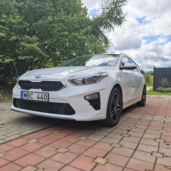 White Kia Ceed 2021 in Vilnius, with an engine capacity of 1.48 L and mileage of 67 thousand km for 14444 €, photo 5 on AUTOMOTO.COM.LV