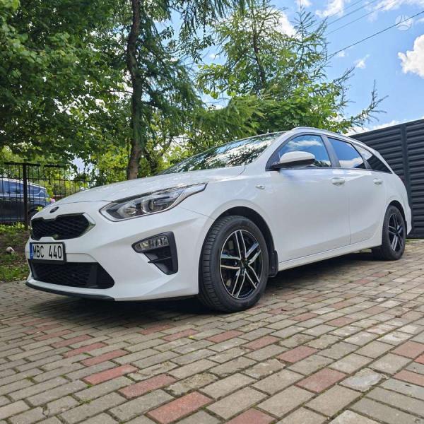 White Kia Ceed 2021 in Vilnius, with an engine capacity of 1.48 L and mileage of 67 thousand km for 14444 €, photo 6 on AUTOMOTO.COM.LV