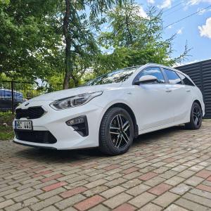 White Kia Ceed 2021 in Vilnius, with an engine capacity of 1.48 L and mileage of 67 thousand km for 14444 €, photo 6 on AUTOMOTO.COM.LV