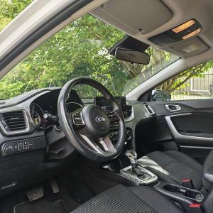 White Kia Ceed 2021 in Vilnius, with an engine capacity of 1.48 L and mileage of 67 thousand km for 14444 €, photo 11 on AUTOMOTO.COM.LV