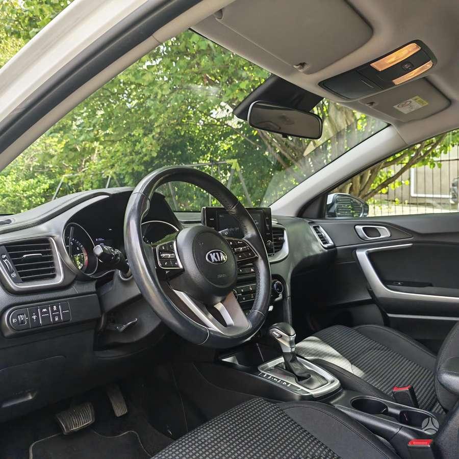 White Kia Ceed 2021 in Vilnius, with an engine capacity of 1.48 L and mileage of 67 thousand km for 14444 €, photo 11 on AUTOMOTO.COM.LV
