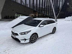 White Kia Ceed 2022 in Vilnius, with an engine capacity of 1.48 L and mileage of 152 thousand km for 13600 €, photo 11 on AUTOMOTO.COM.LV