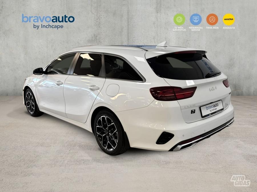 White Kia Ceed 2022 in Vilnius, with an engine capacity of 1.50 L and mileage of 88 thousand km for 19990 €, photo 4 on AUTOMOTO.COM.LV