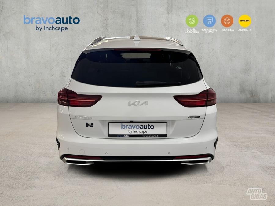 White Kia Ceed 2022 in Vilnius, with an engine capacity of 1.50 L and mileage of 88 thousand km for 19990 €, photo 5 on AUTOMOTO.COM.LV