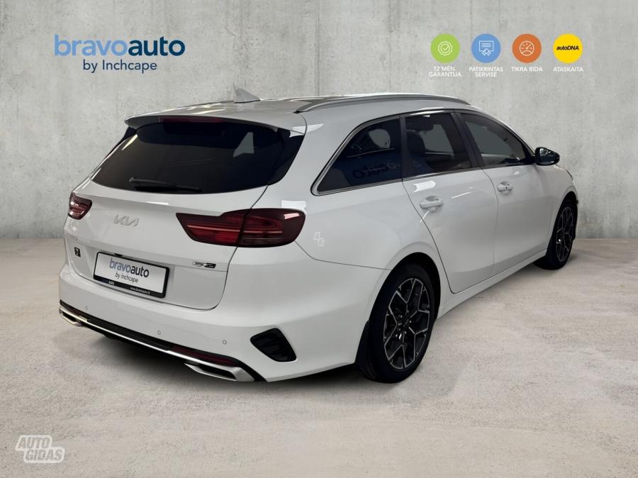 White Kia Ceed 2022 in Vilnius, with an engine capacity of 1.50 L and mileage of 88 thousand km for 19990 €, photo 6 on AUTOMOTO.COM.LV