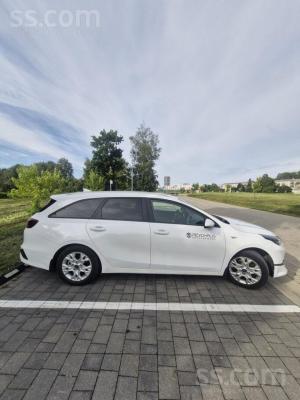 White Kia Ceed 2023 in Riga, with an engine capacity of 1.50 L and mileage of 90 thousand km for 14200 €, photo 3 on AUTOMOTO.COM.LV