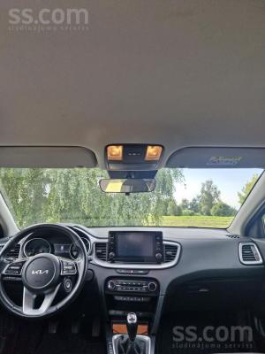 White Kia Ceed 2023 in Riga, with an engine capacity of 1.50 L and mileage of 90 thousand km for 14200 €, photo 6 on AUTOMOTO.COM.LV