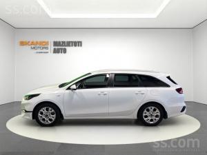White Kia Ceed 2023 in Riga, with an engine capacity of 1.50 L and mileage of 92 thousand km for 14990 €, photo 4 on AUTOMOTO.COM.LV