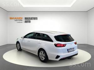 White Kia Ceed 2023 in Riga, with an engine capacity of 1.50 L and mileage of 92 thousand km for 14990 €, photo 5 on AUTOMOTO.COM.LV