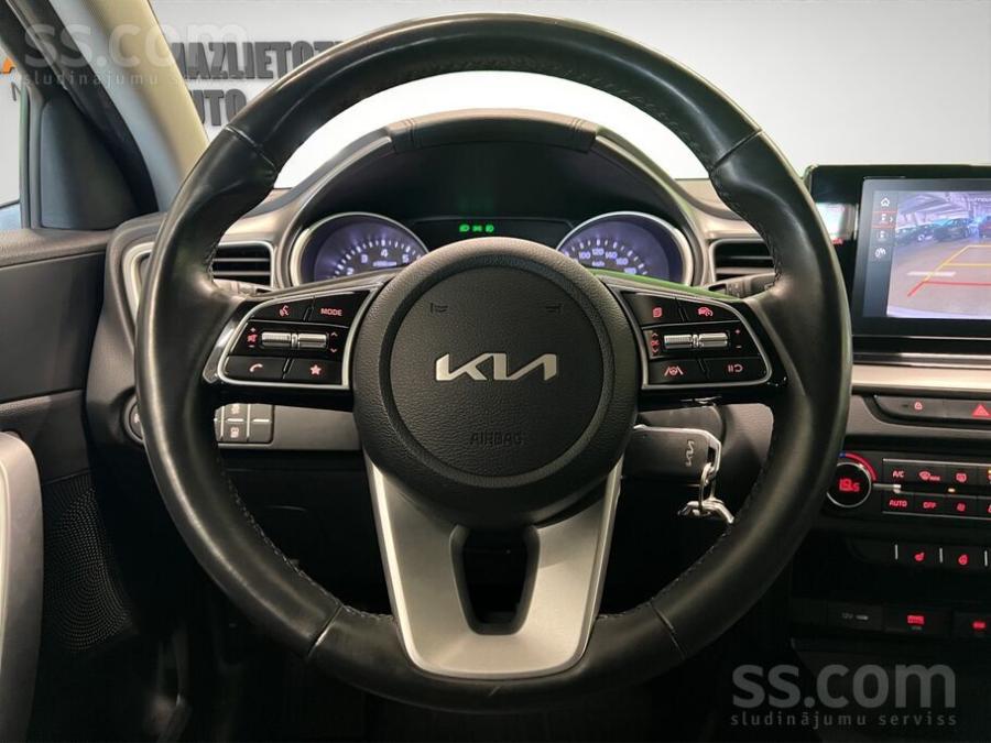White Kia Ceed 2023 in Riga, with an engine capacity of 1.50 L and mileage of 92 thousand km for 14990 €, photo 12 on AUTOMOTO.COM.LV
