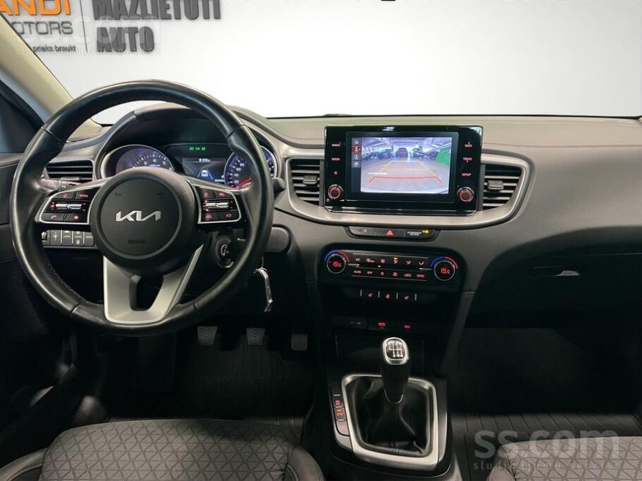 White Kia Ceed 2023 in Riga, with an engine capacity of 1.50 L and mileage of 92 thousand km for 14990 €, photo 16 on AUTOMOTO.COM.LV