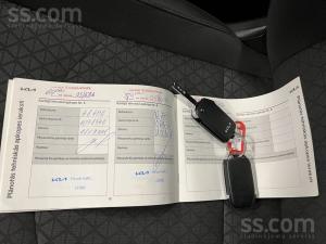 White Kia Ceed 2023 in Riga, with an engine capacity of 1.50 L and mileage of 92 thousand km for 14990 €, photo 25 on AUTOMOTO.COM.LV