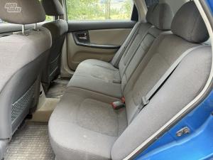 Blue Kia Cerato 2006 in Vilnius, with an engine capacity of 2.00 L and mileage of 226 thousand km for 580 €, photo 8 on AUTOMOTO.COM.LV