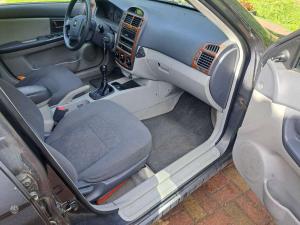 Zaļš Kia Cerato 2005 Kauņa, ar dzinēja tilpumu 1.49 L un nobraukumu 205 tūkst. km par 900 €, foto 5 vietnē AUTOMOTO.COM.LV