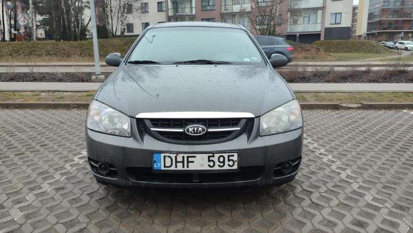 Grey Kia Cerato 2006 in Vilnius, with an engine capacity of 1.60 L and mileage of 101 thousand km for 1250 €, photo 4 on AUTOMOTO.COM.LV