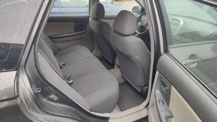 Pelēks Kia Cerato 2006 Viļņa, ar dzinēja tilpumu 1.60 L un nobraukumu 101 tūkst. km par 1250 €, foto 9 vietnē AUTOMOTO.COM.LV
