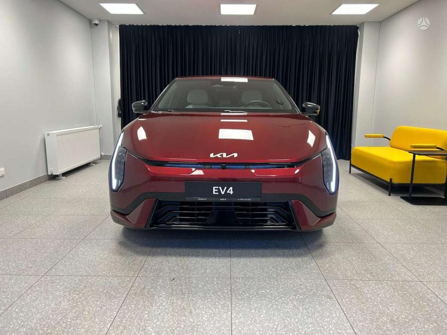 Red Kia EV4 2026 in Vilnius, with an engine capacity of 0.00 L and mileage of 1 thousand km for 46990 €, photo 4 on AUTOMOTO.COM.LV