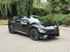 Black Kia EV6 2025 in Prienai, with an engine capacity of 0.00 L and mileage of 4 thousand km for 39900 €, photo  on AUTOMOTO.COM.LV