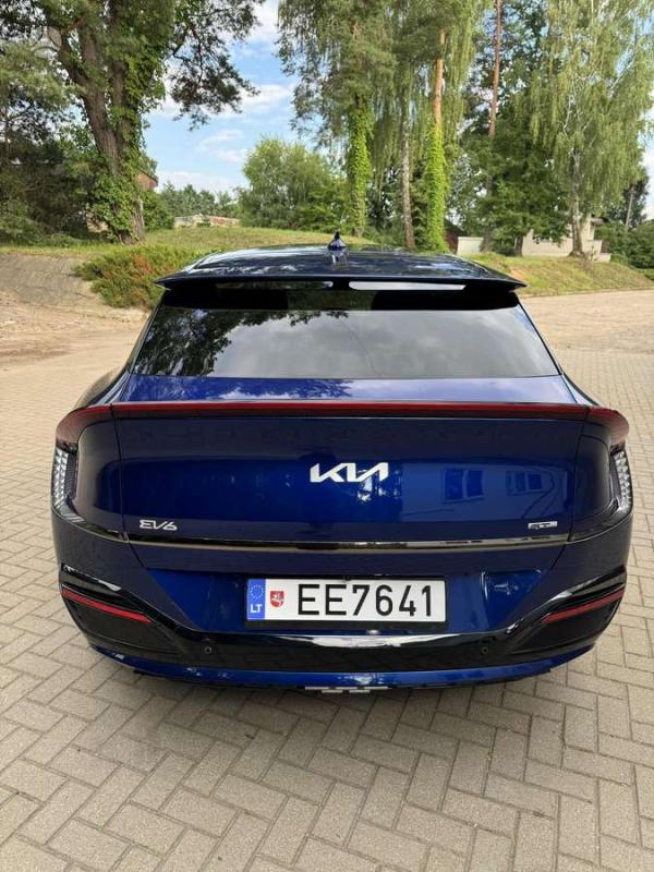 Blue Kia EV6 2023 in Prienai, with an engine capacity of 0.00 L and mileage of 61 thousand km for 25999 €, photo 7 on AUTOMOTO.COM.LV