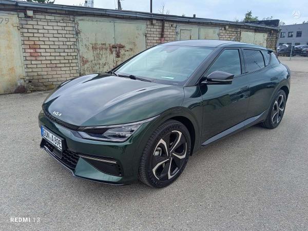 Green Kia EV6 2022 in Kaunas, with an engine capacity of 0.00 L and mileage of 55 thousand km for 23500 €, photo 1 on AUTOMOTO.COM.LV