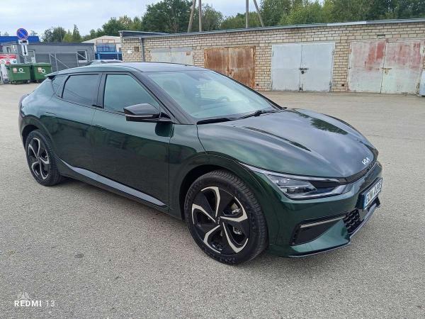 Green Kia EV6 2022 in Kaunas, with an engine capacity of 0.00 L and mileage of 55 thousand km for 23500 €, photo 3 on AUTOMOTO.COM.LV