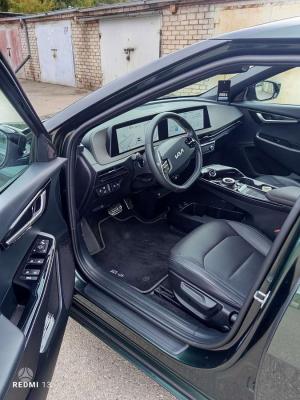 Green Kia EV6 2022 in Kaunas, with an engine capacity of 0.00 L and mileage of 55 thousand km for 23500 €, photo 7 on AUTOMOTO.COM.LV