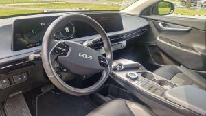Grey Kia EV6 2022 in Kaunas, with an engine capacity of 0.00 L and mileage of 84 thousand km for 21700 €, photo 12 on AUTOMOTO.COM.LV