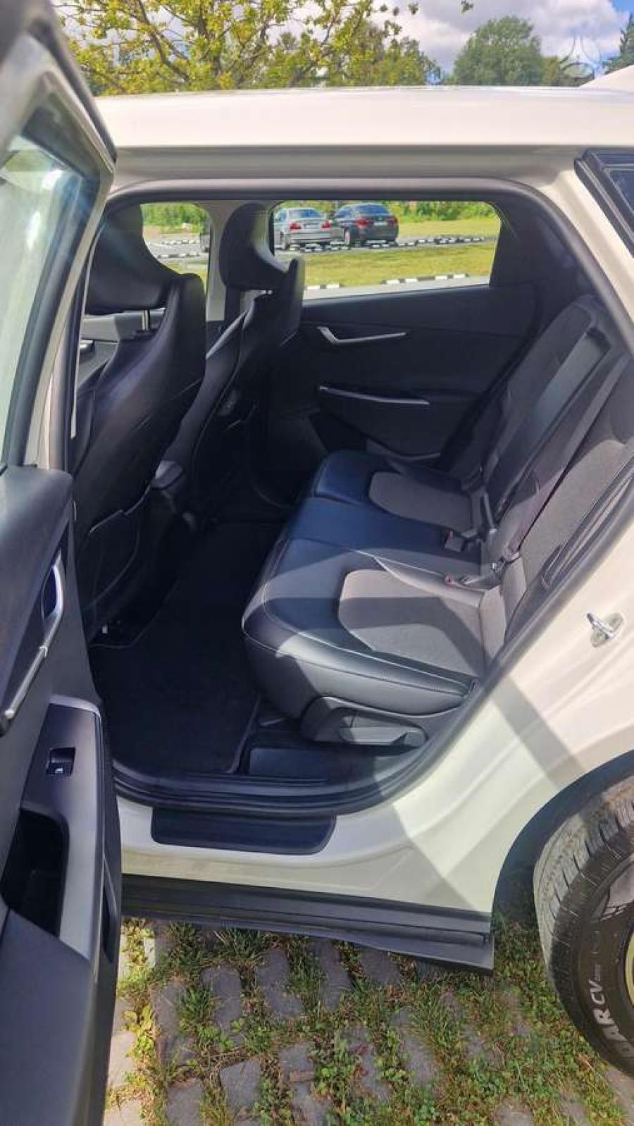 Grey Kia EV6 2022 in Kaunas, with an engine capacity of 0.00 L and mileage of 84 thousand km for 21700 €, photo 13 on AUTOMOTO.COM.LV