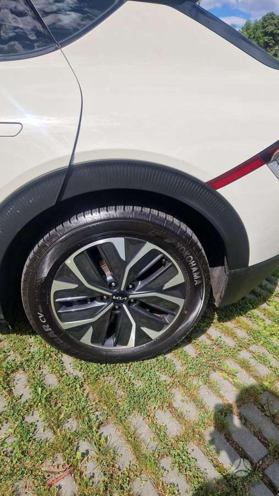 Grey Kia EV6 2022 in Kaunas, with an engine capacity of 0.00 L and mileage of 84 thousand km for 21700 €, photo 14 on AUTOMOTO.COM.LV