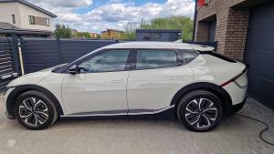 Grey Kia EV6 2022 in Kaunas, with an engine capacity of 0.00 L and mileage of 84 thousand km for 21700 €, photo 18 on AUTOMOTO.COM.LV