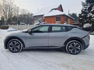 Grey Kia EV6 2022 in Panevezys, with an engine capacity of 0.00 L and mileage of 150 thousand km for 17790 €, photo 12 on AUTOMOTO.COM.LV