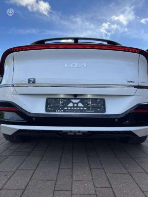 White Kia EV6 2023 in Rokiskis, with an engine capacity of 0.00 L and mileage of 74 thousand km for 31300 €, photo 17 on AUTOMOTO.COM.LV