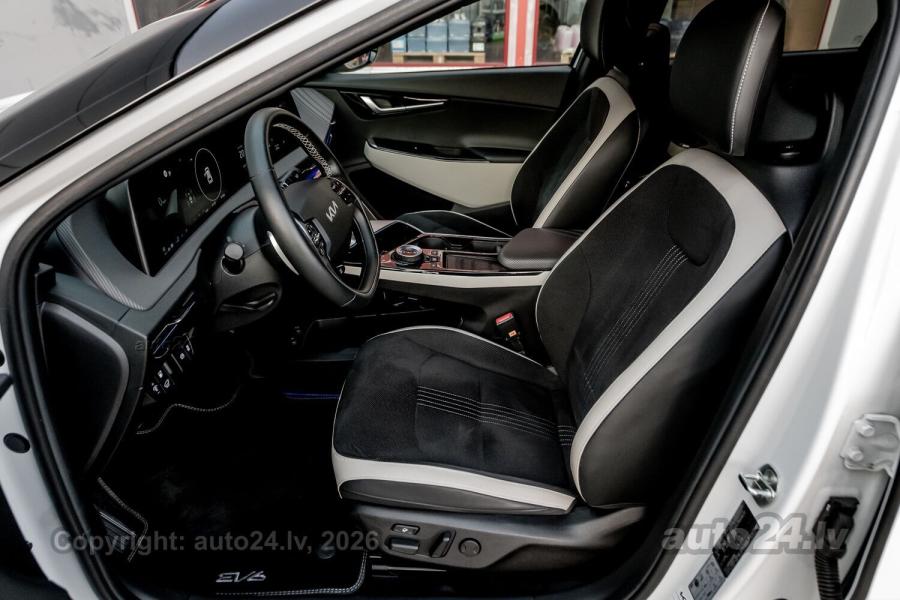 White Kia EV6 2022 in Parnu, with an engine capacity of 0.00 L and mileage of 82 thousand km for 34900 €, photo 18 on AUTOMOTO.COM.LV