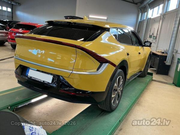 Yellow Kia EV6 2022 in Tallinn, with an engine capacity of 0.00 L and mileage of 89 thousand km for 32990 €, photo 2 on AUTOMOTO.COM.LV